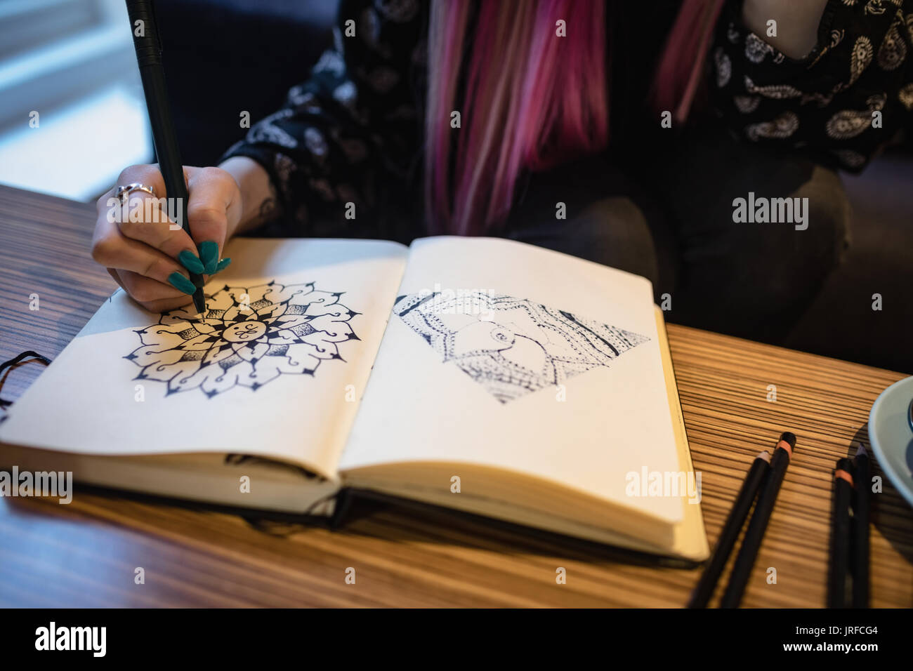 Book designing hi-res stock photography and images - Alamy