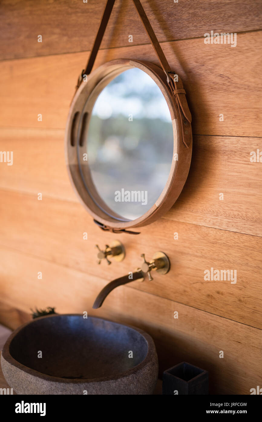 Mirror and basin in cottage Stock Photo - Alamy