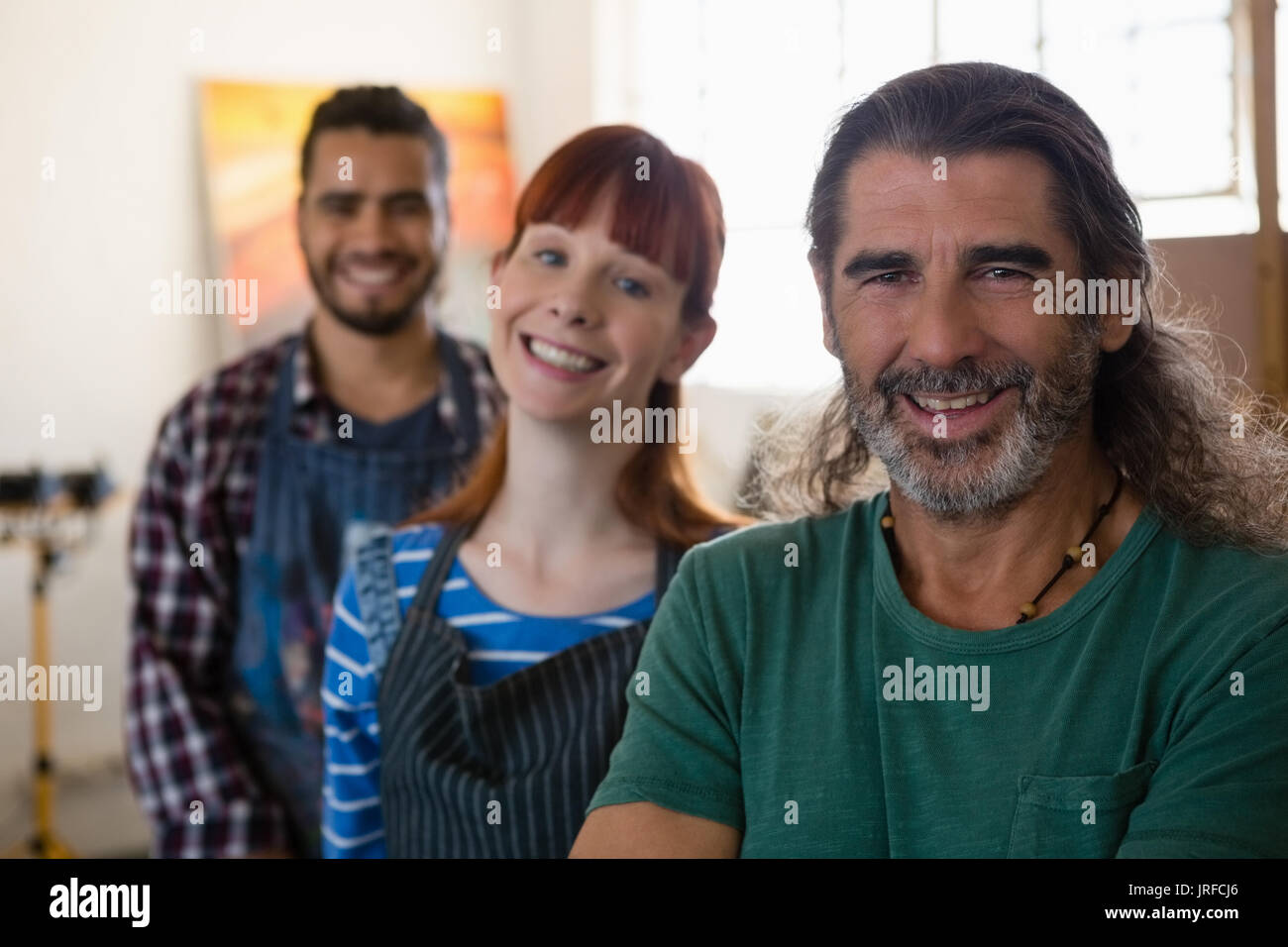 Portrait of happy adult students in art class Stock Photo - Alamy