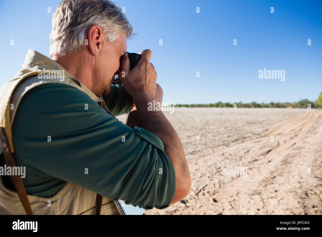 Standing looking at camera gesturing communication hi-res stock ...