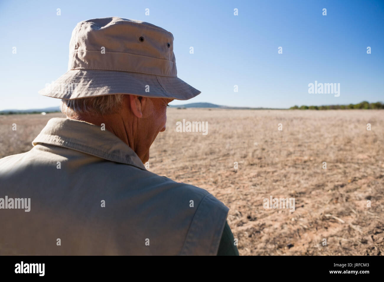 Man wearing hat rear view hi-res stock photography and images - Alamy