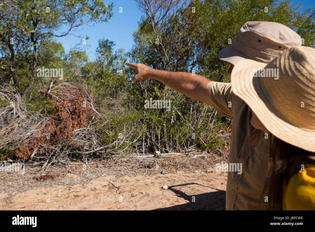 Couple pointing in field hi-res stock photography and images - Alamy