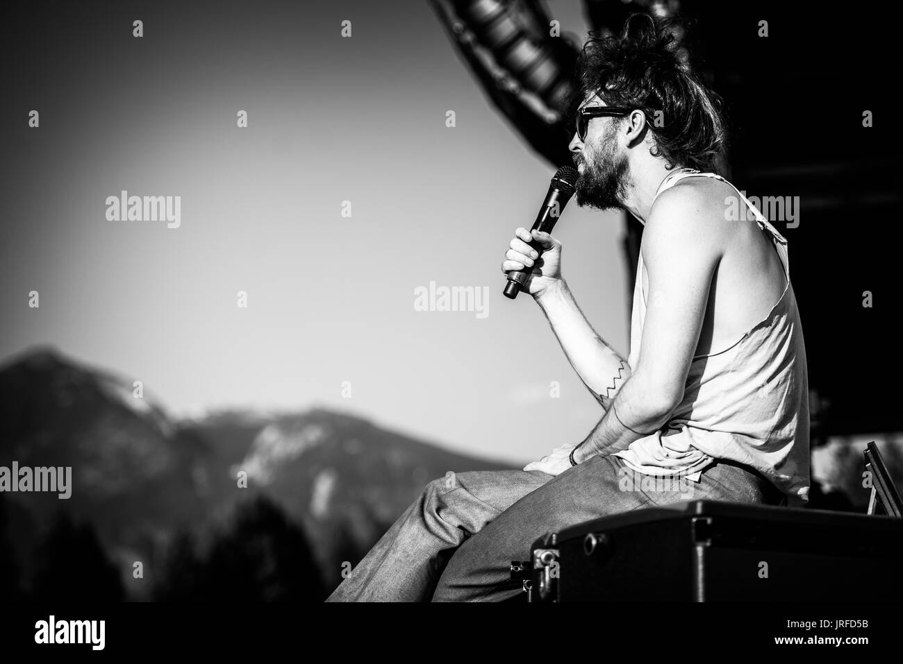 Edward Sharpe and the Magnetic Zeros performing at a music festival in ...