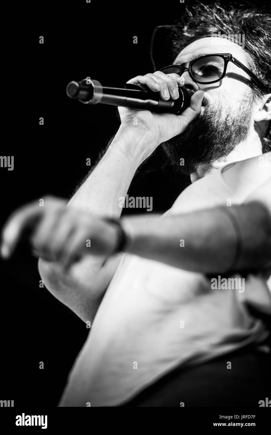 Edward Sharpe and the Magnetic Zeros performing at a music festival in ...