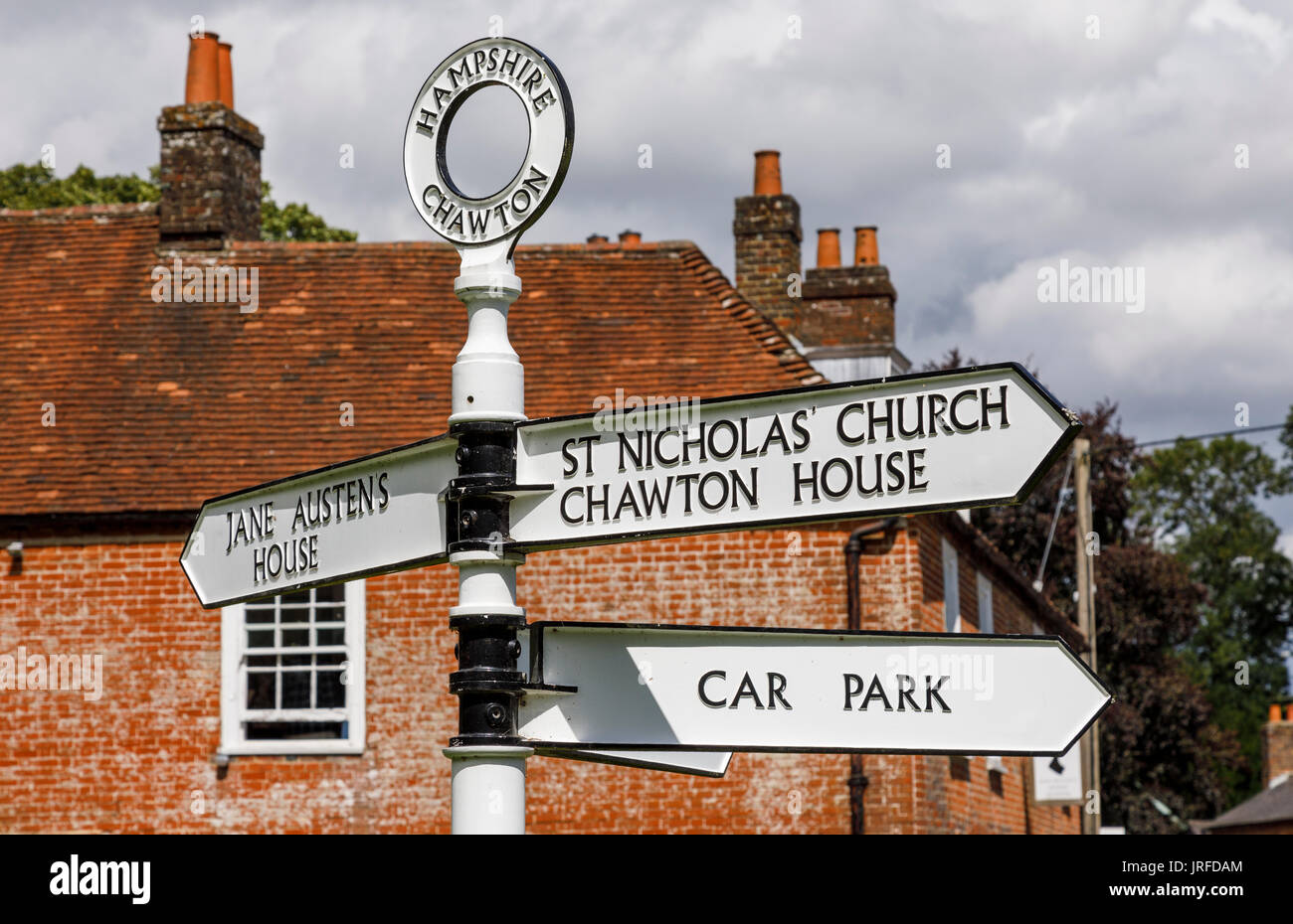 Traditional old-fashioned signpost in front of Jane Austen's House ...