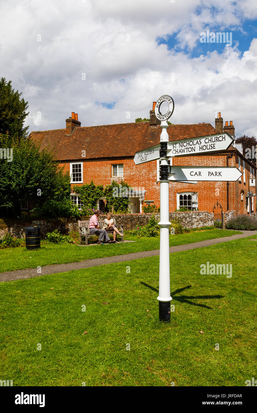 Traditional old-fashioned signpost in front of Jane Austen's House ...