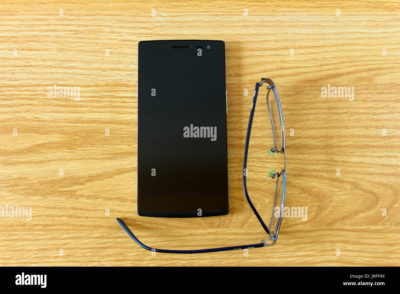 Smartphone and eyes glass closed up on the floor (rest your eyes Stock ...