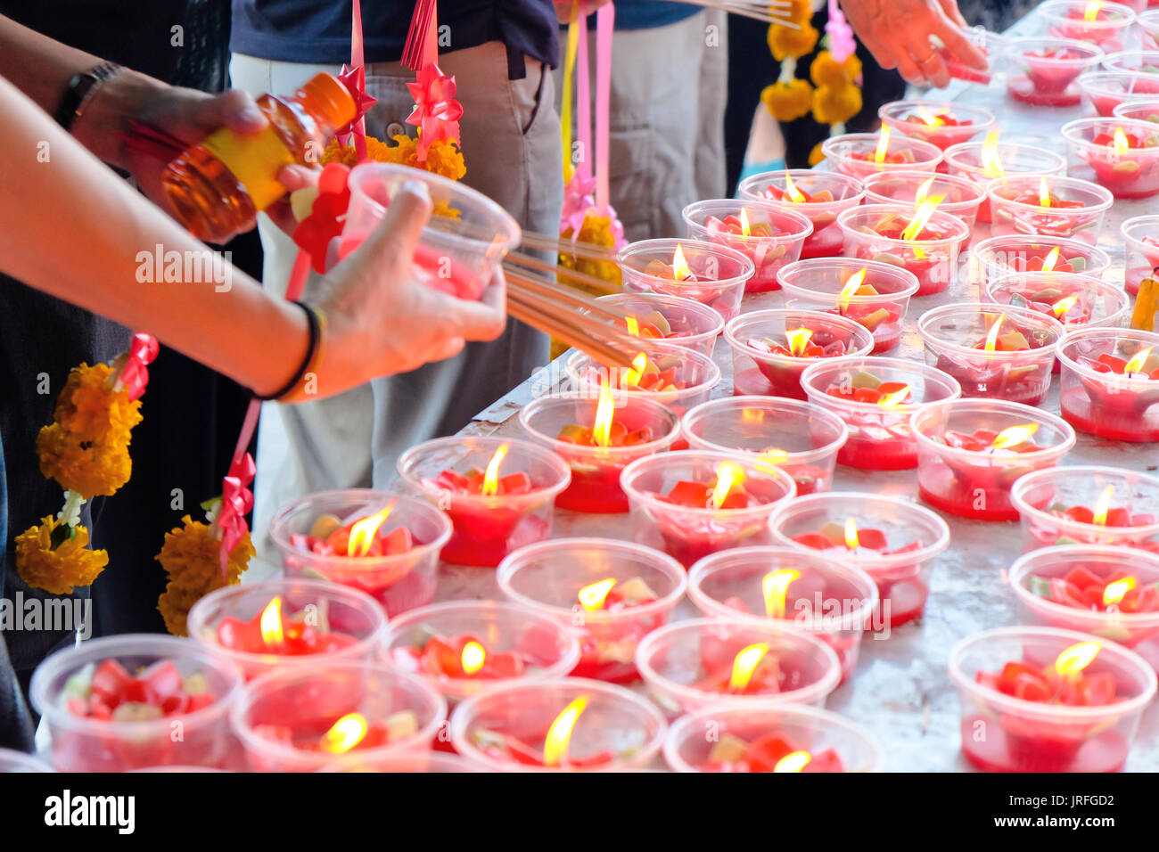 burning red chinese candle in temple Stock Photo - Alamy