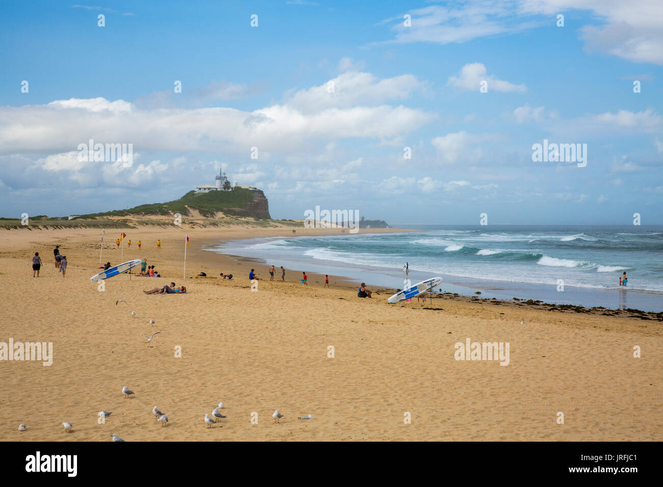 Nobbys Beach and nobbys head lighthouse in Newcastle, second largest ...