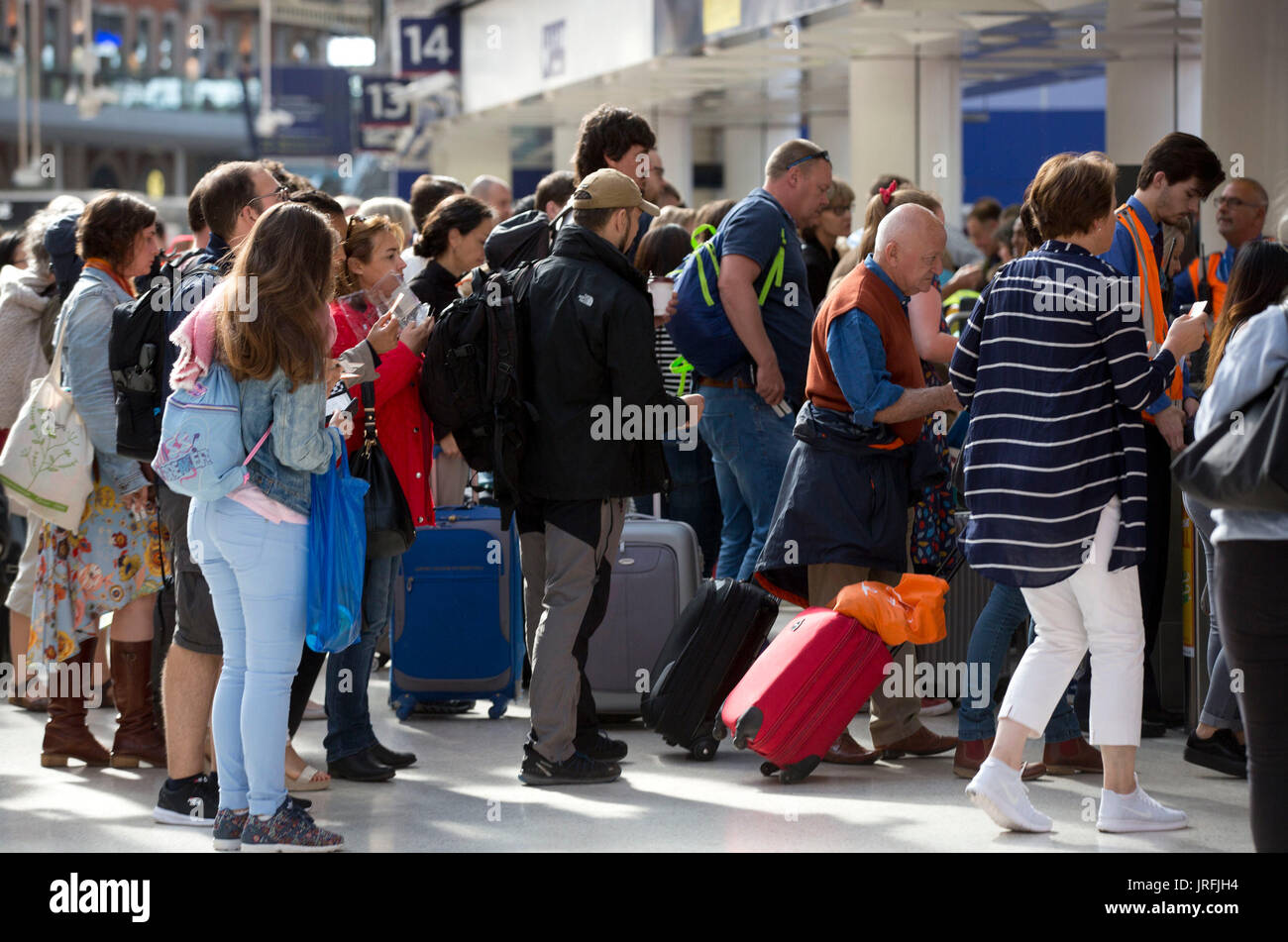 Passengers entering through gates hi-res stock photography and images ...