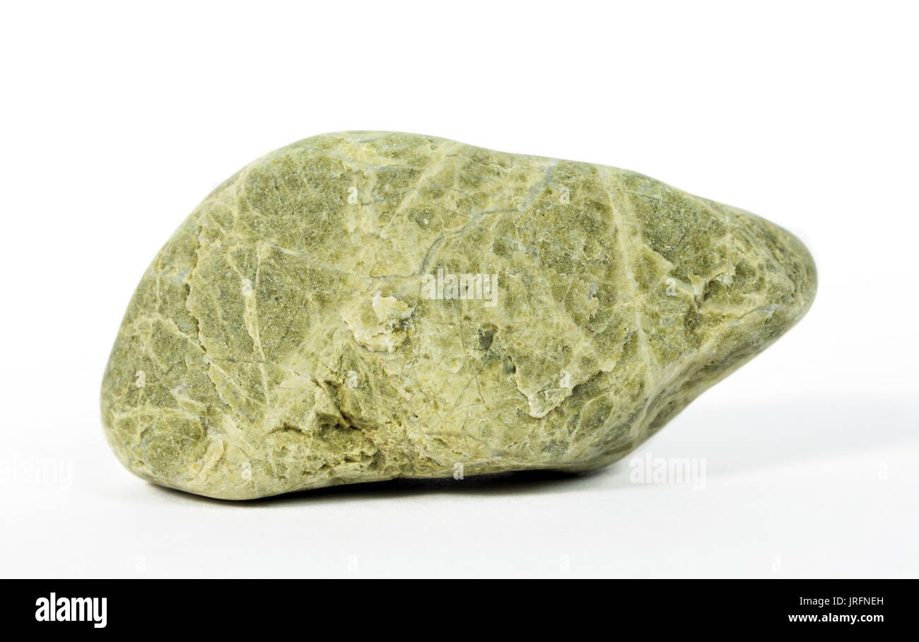 Stone from the sea on white Stock Photo - Alamy