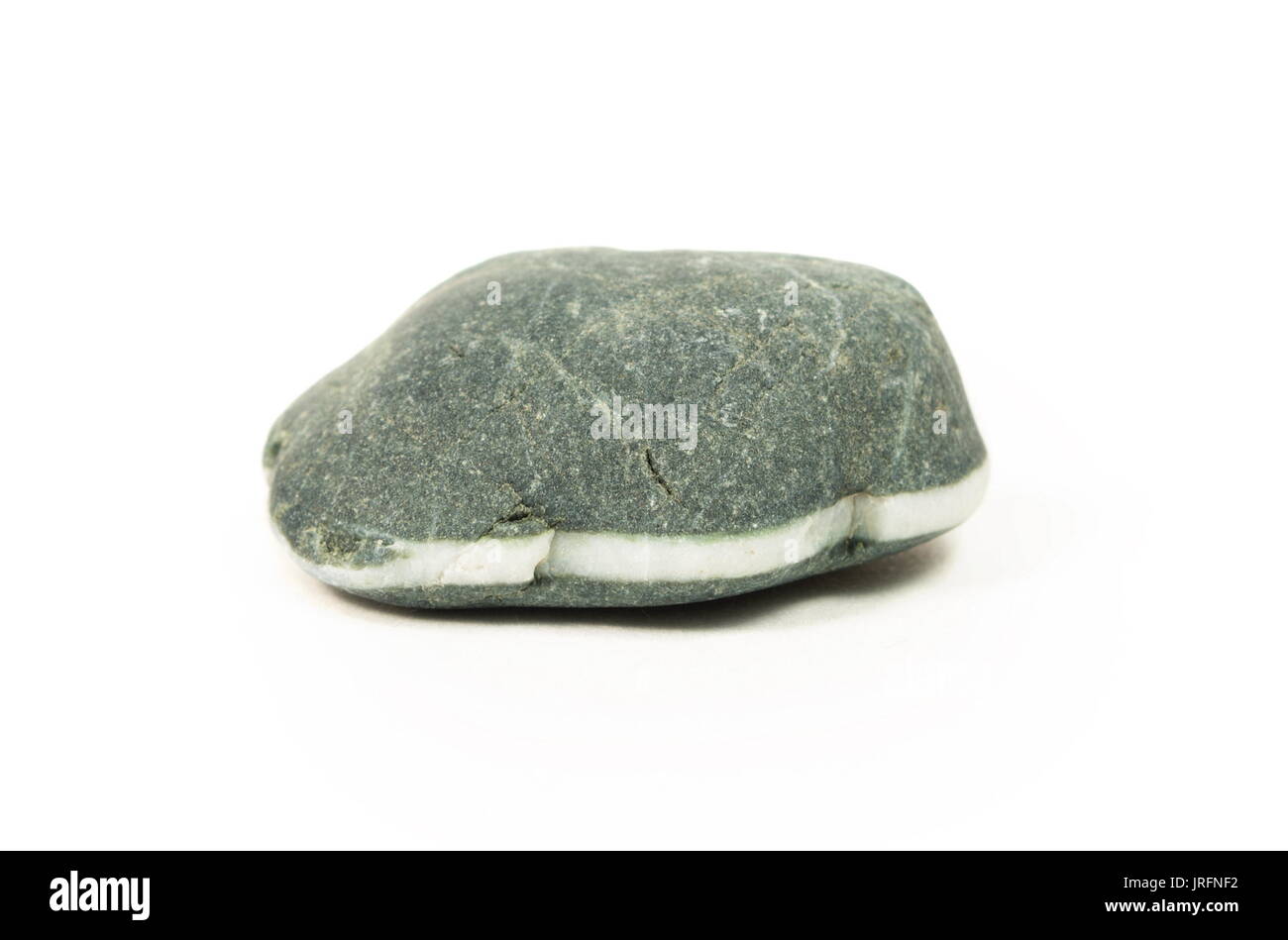 Stone from the sea on white Stock Photo - Alamy