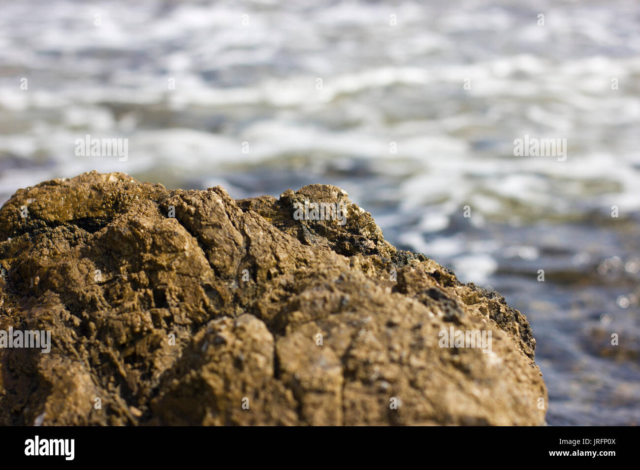 Stones on the beach at the sea under water Stock Photo - Alamy