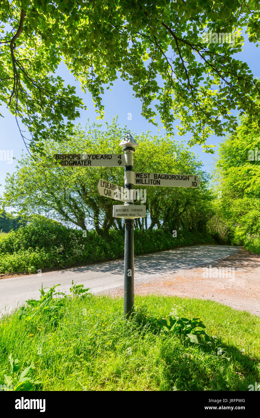 A vintage cast iron road sign at Birches Corner on the Quantock Hills ...