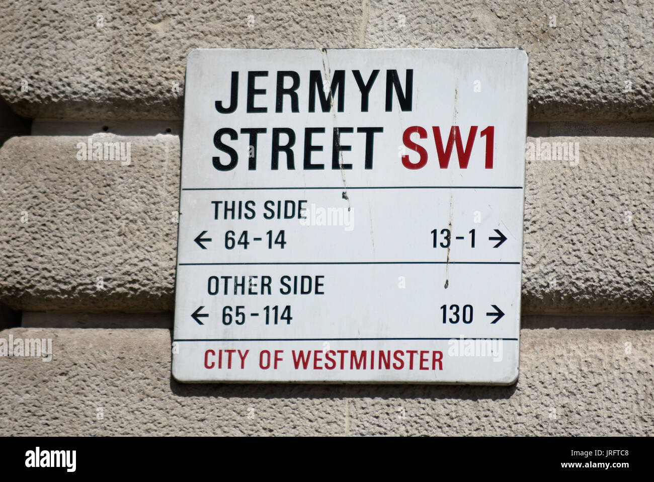Wall mounted street sign hi-res stock photography and images - Alamy
