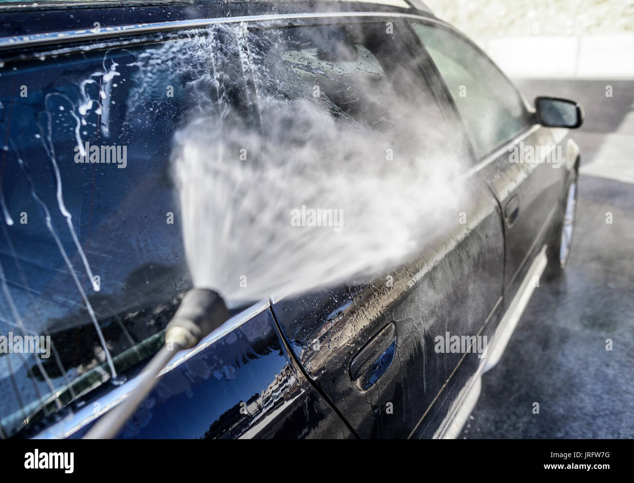 High-pressure washing car outdoors Stock Photo - Alamy