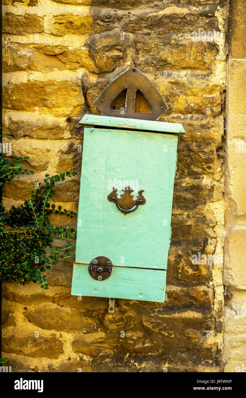 Old letterbox in the door, traditional way of delivering letters to the ...