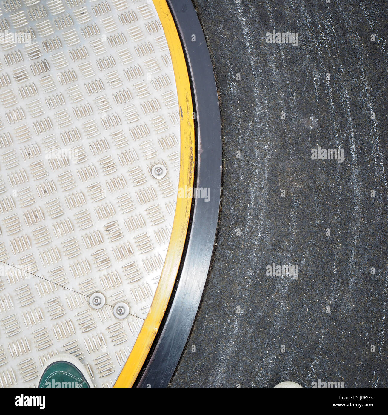 Metal grip on playground roundabout Stock Photo - Alamy