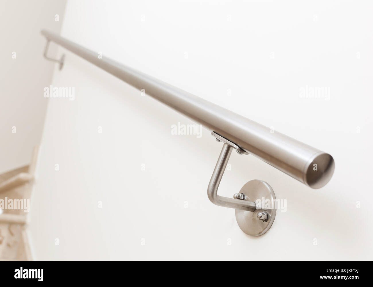 Modern steel handrail for stairs, interior house Stock Photo - Alamy