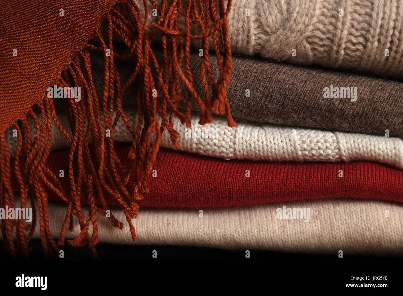 Folded sweaters hi-res stock photography and images - Alamy
