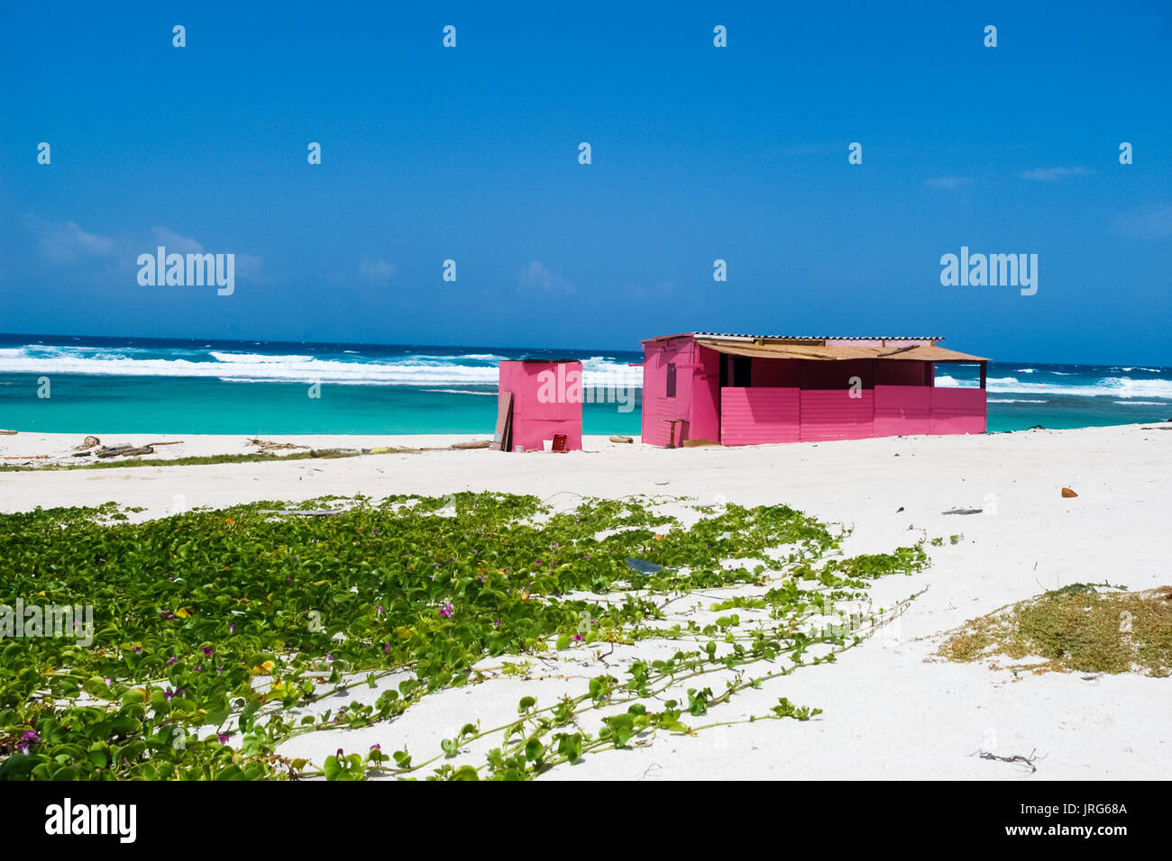 Aruba pink beach shack Boca Prins Stock Photo - Alamy
