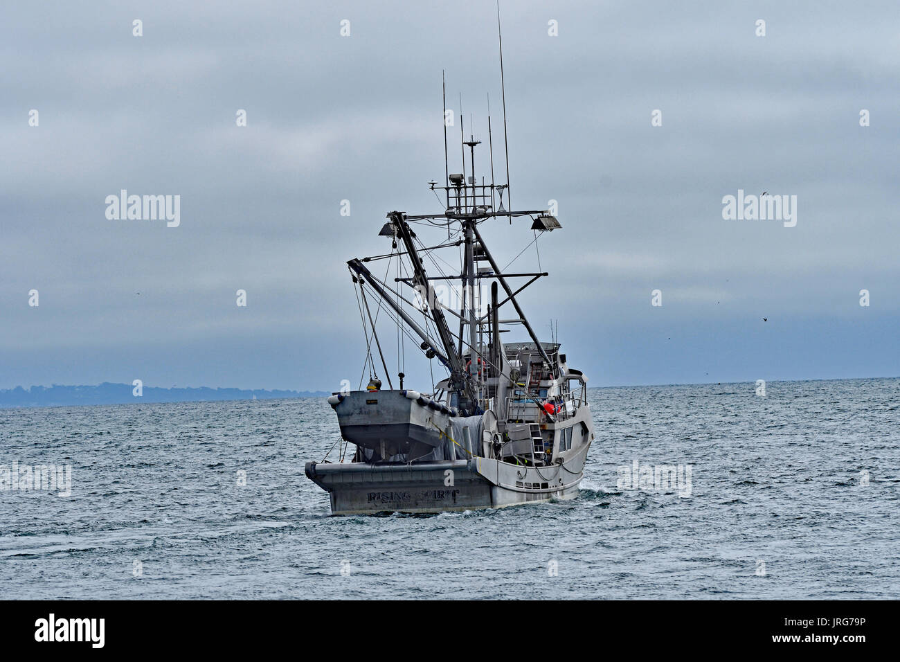 A Ship heading to high sea Stock Photo - Alamy