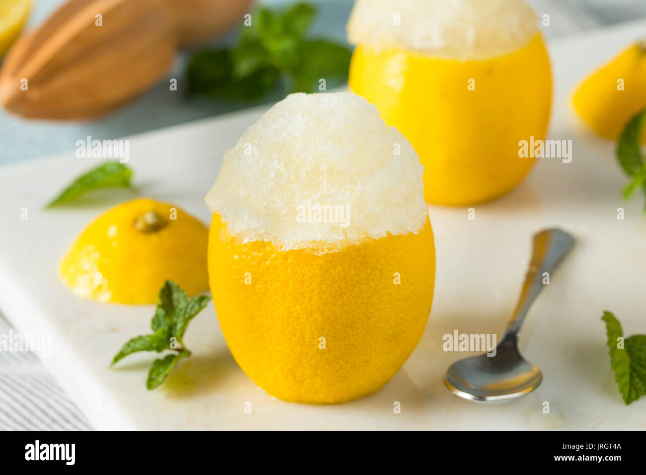 Homemade Yellow Lemon Italian Ice in a Lemons Stock Photo - Alamy