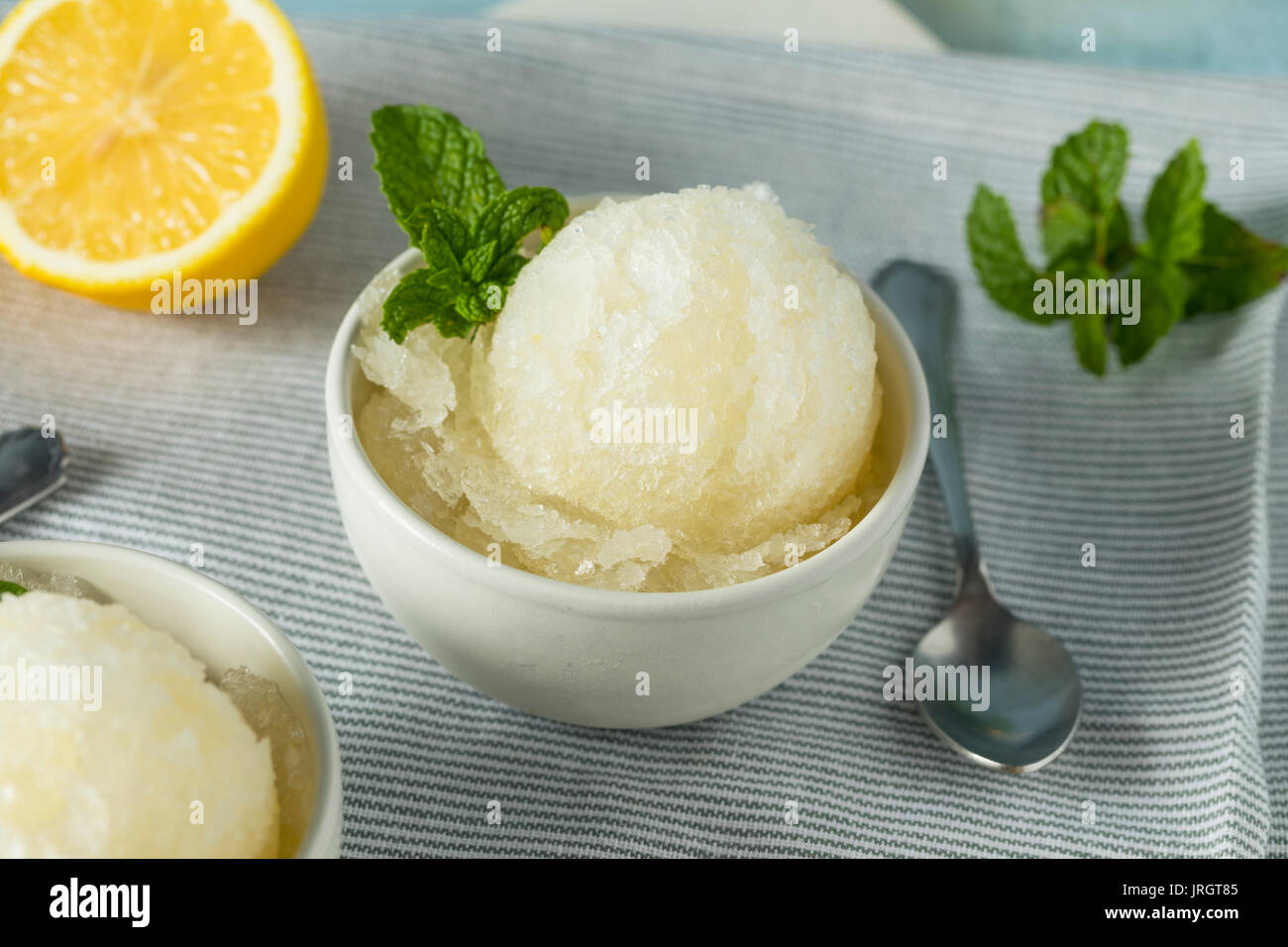 Homemade Yellow Lemon Italian Ice in a Bowl Stock Photo - Alamy