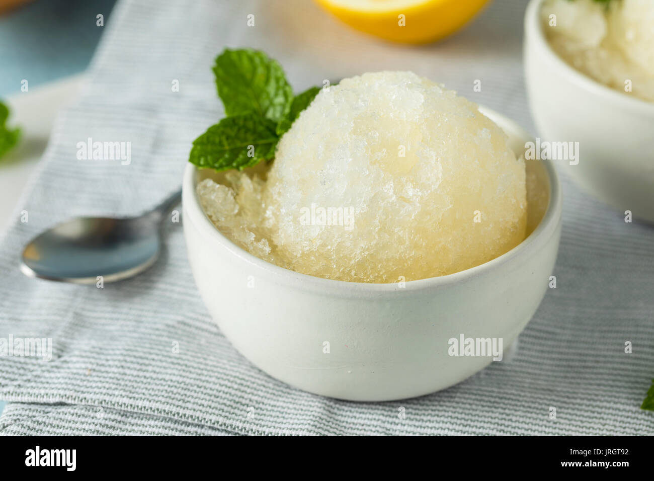 Homemade Yellow Lemon Italian Ice in a Bowl Stock Photo - Alamy