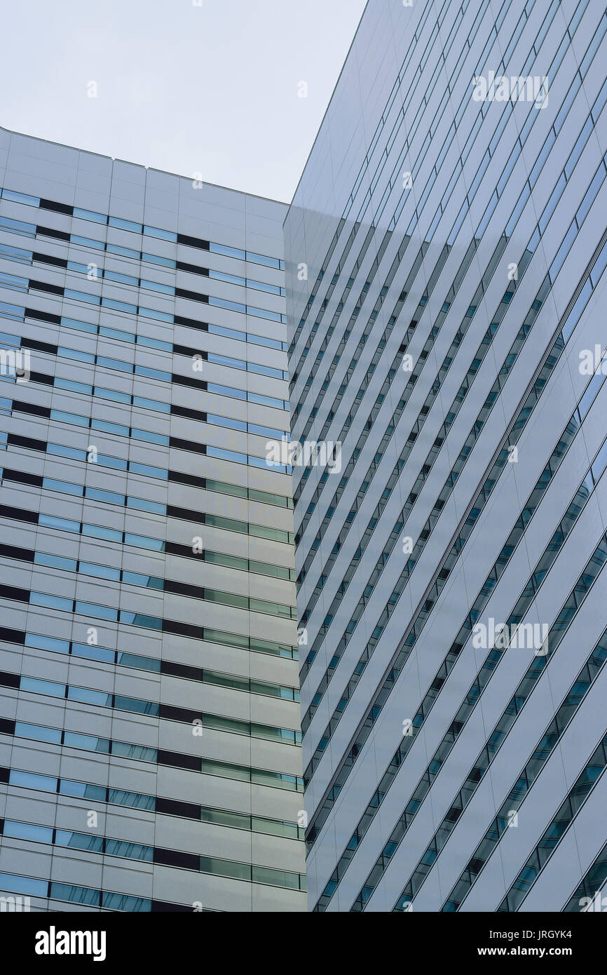 Tall office building in blue sky background Stock Photo - Alamy