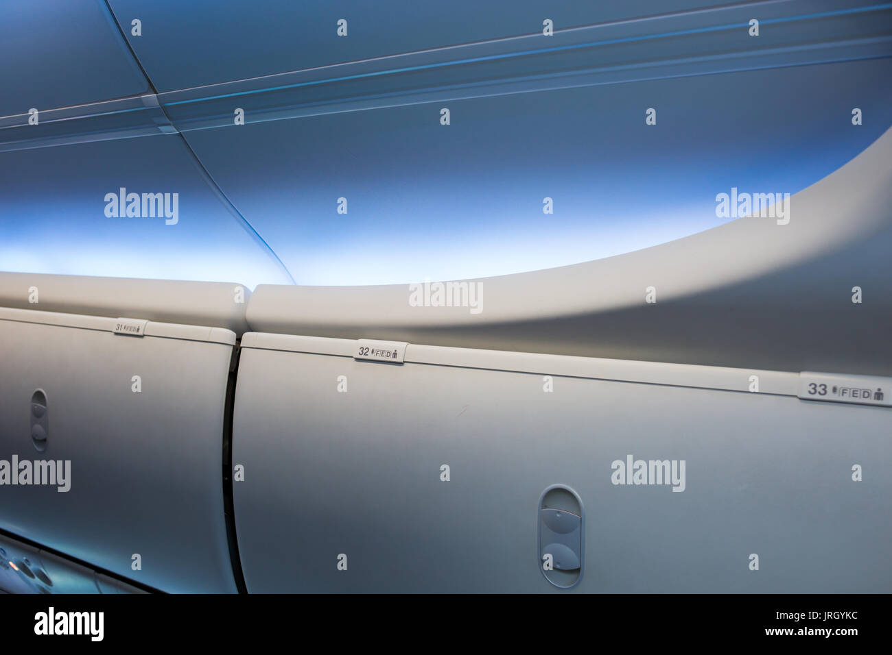 Interiors of new modern airliner Stock Photo - Alamy