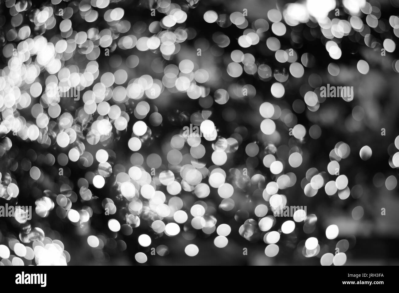 Silver glitter abstract bokeh Black and White Stock Photos & Images - Alamy