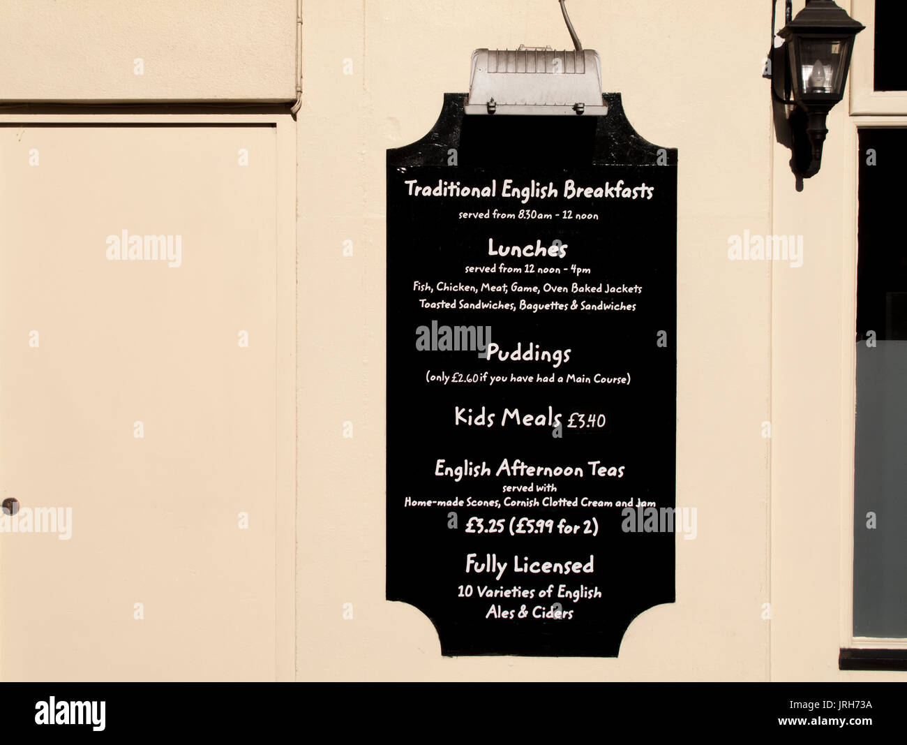 Restaurant menu mounted on wall Stock Photo - Alamy