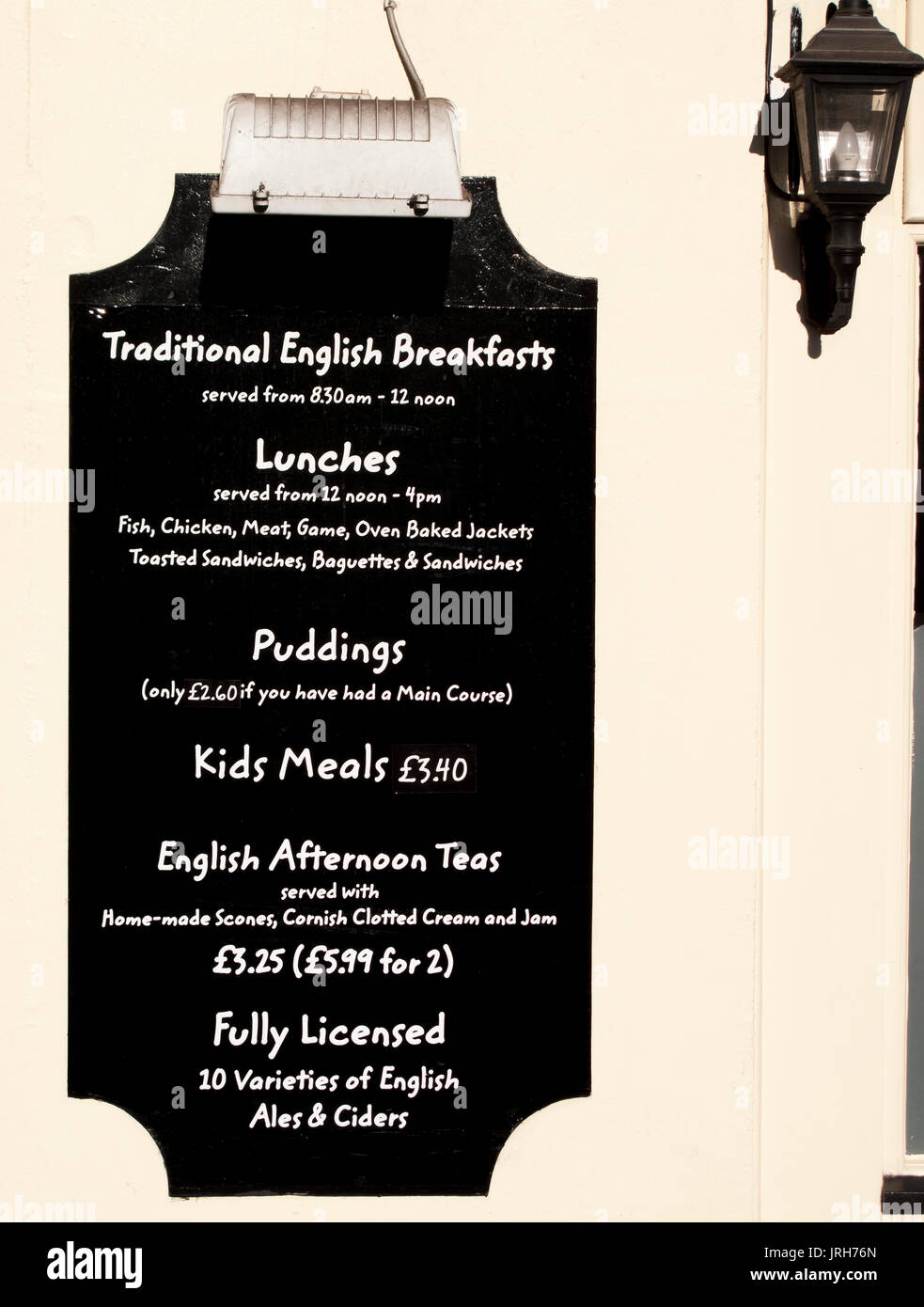 Restaurant menu mounted on wall Stock Photo - Alamy