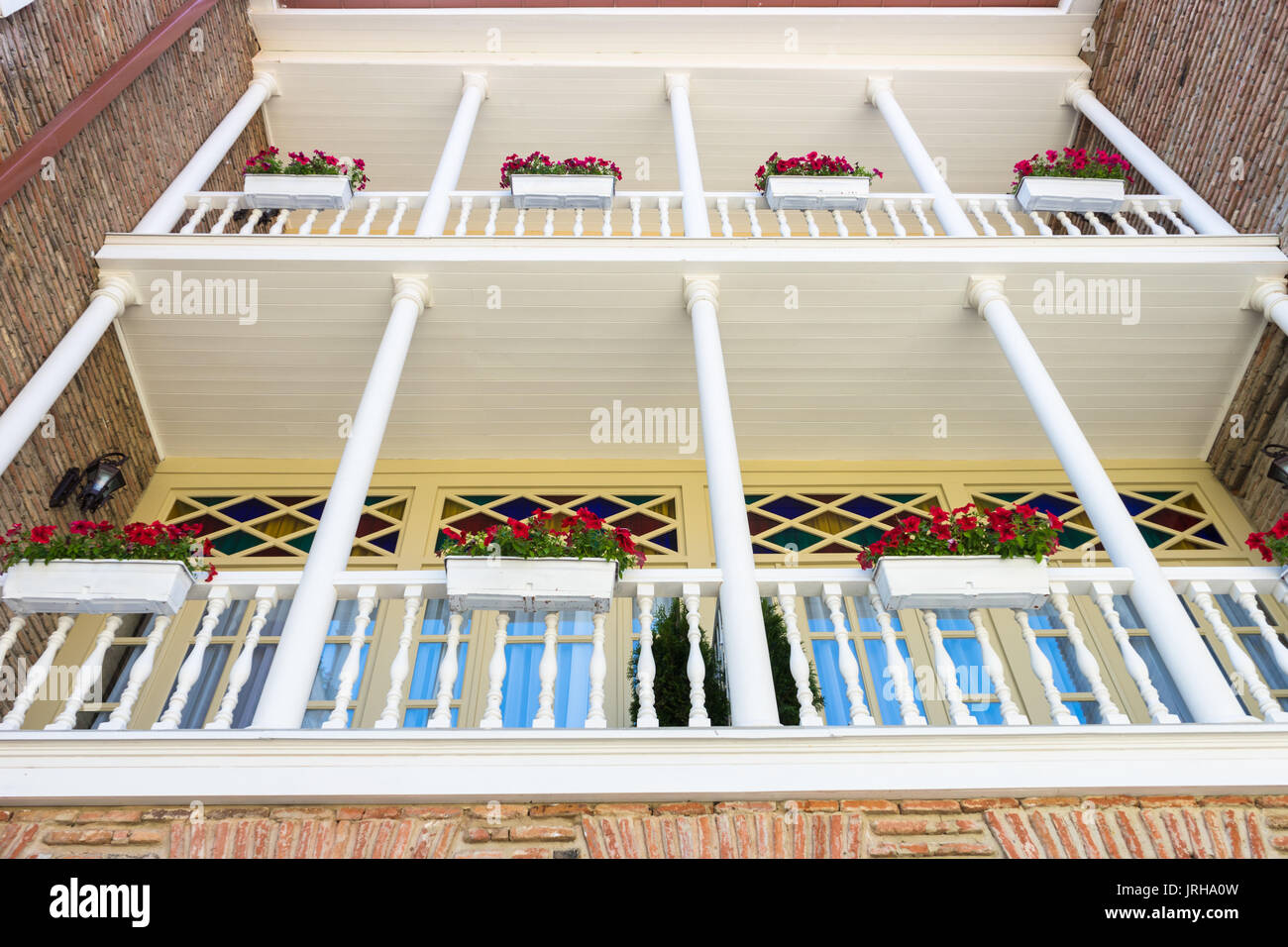 Traditional georgian architecture with carving balconies Stock Photo ...