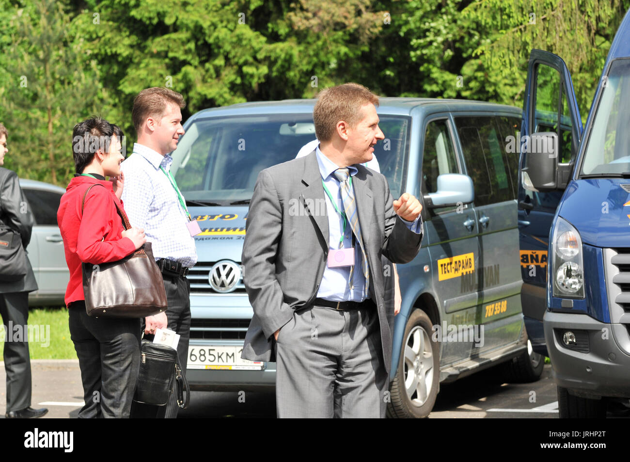 MOSCOW, RUSSIA - June 3, 2009 - People at car dealership Stock Photo ...
