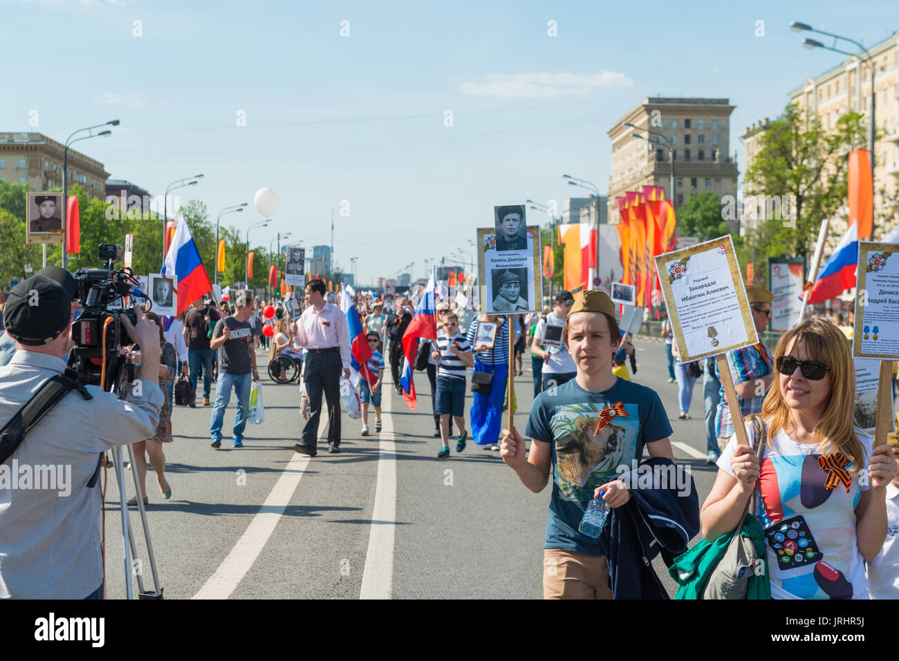 Moscow, Russia - May 9: Immortal Regiment marches on. Moscow celebrates ...