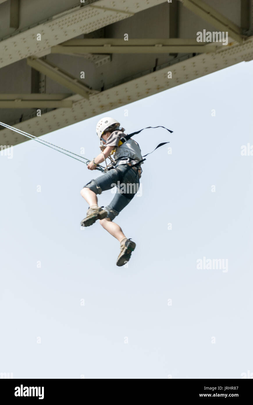 Person bungee jumping off bridge hi-res stock photography and images ...