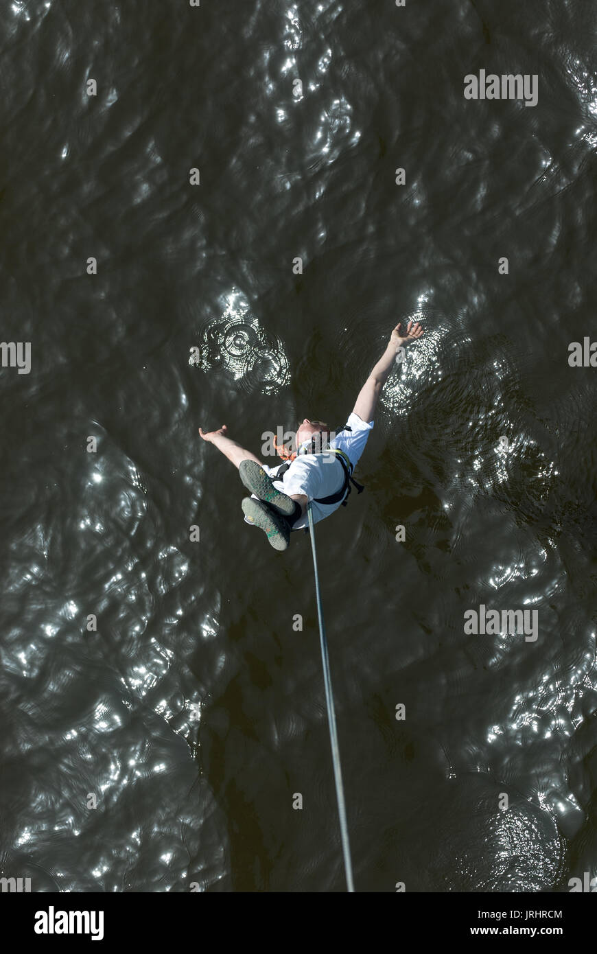Person bungee jumping off bridge hi-res stock photography and images ...