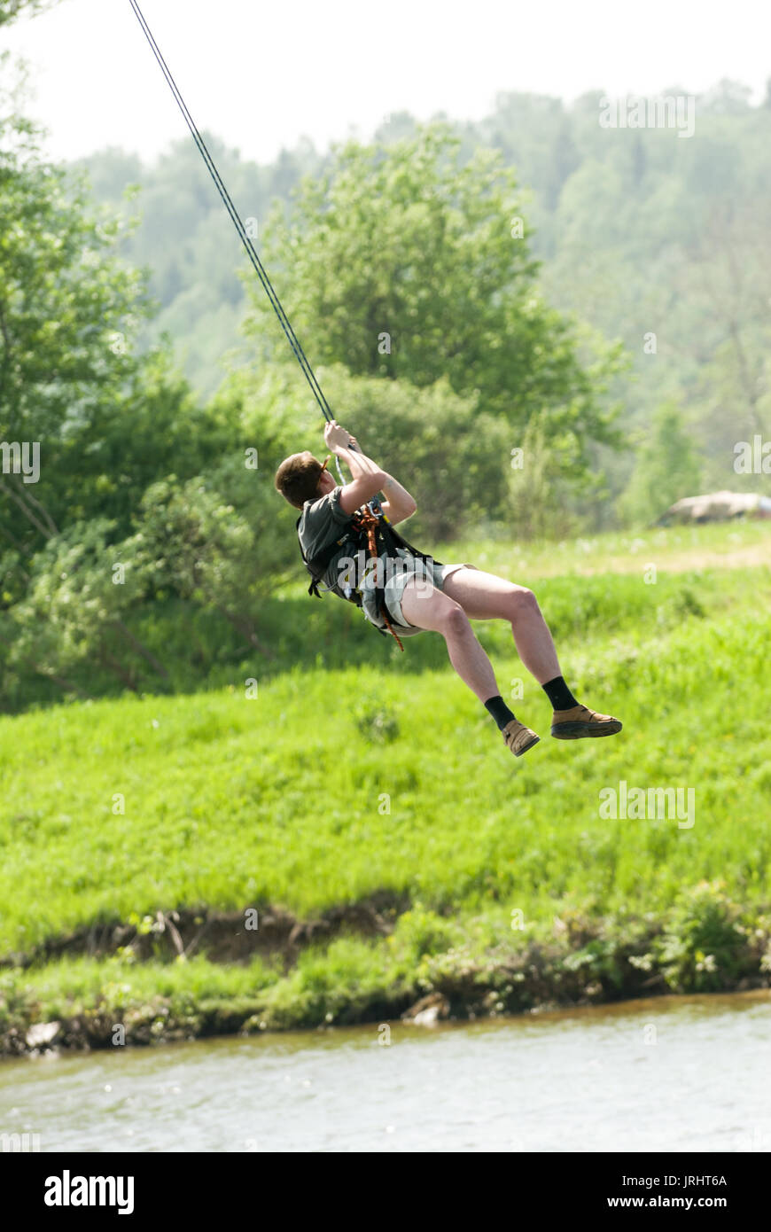 Extreme ropejumping scene Stock Photo - Alamy