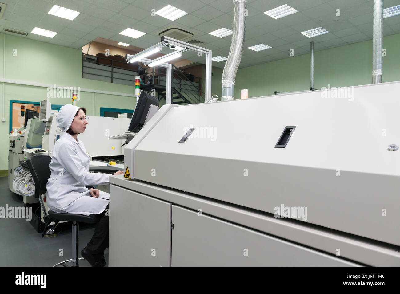 Production of electronic components at high-tech factory Stock Photo ...
