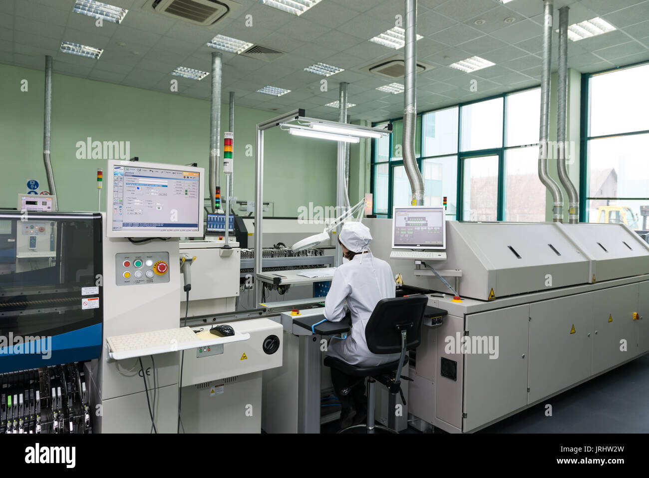 Production of electronic components at high-tech factory Stock Photo ...