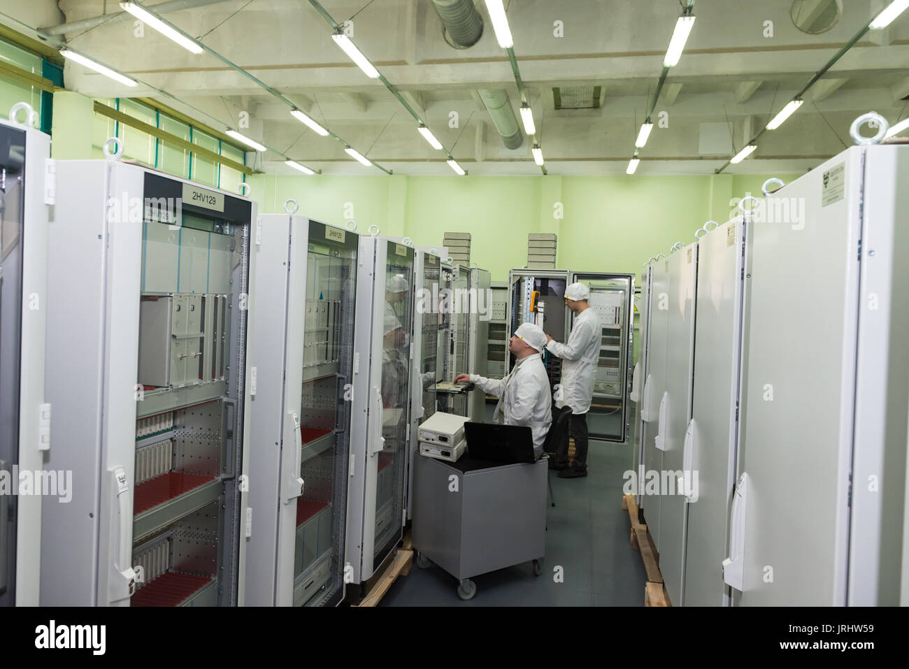 Production of electronic components at high-tech factory Stock Photo ...