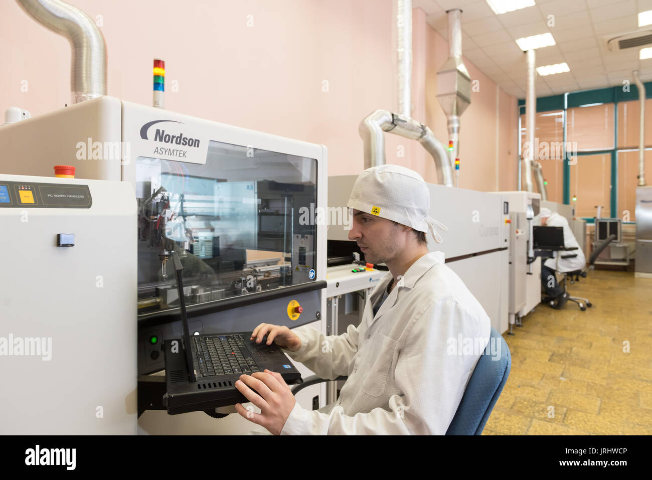 Production of electronic components at high-tech factory Stock Photo ...