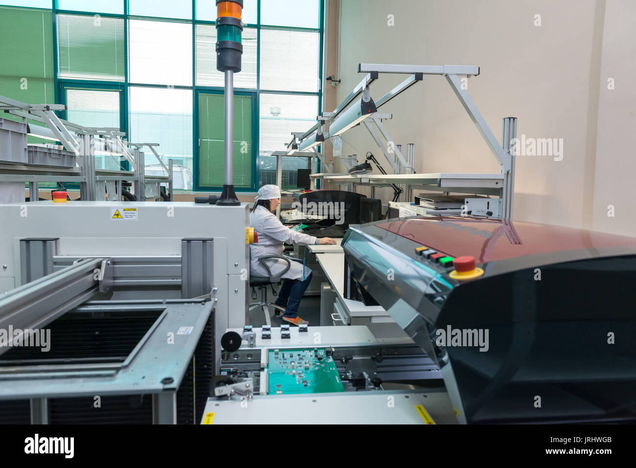 Production of electronic components at high-tech factory Stock Photo ...