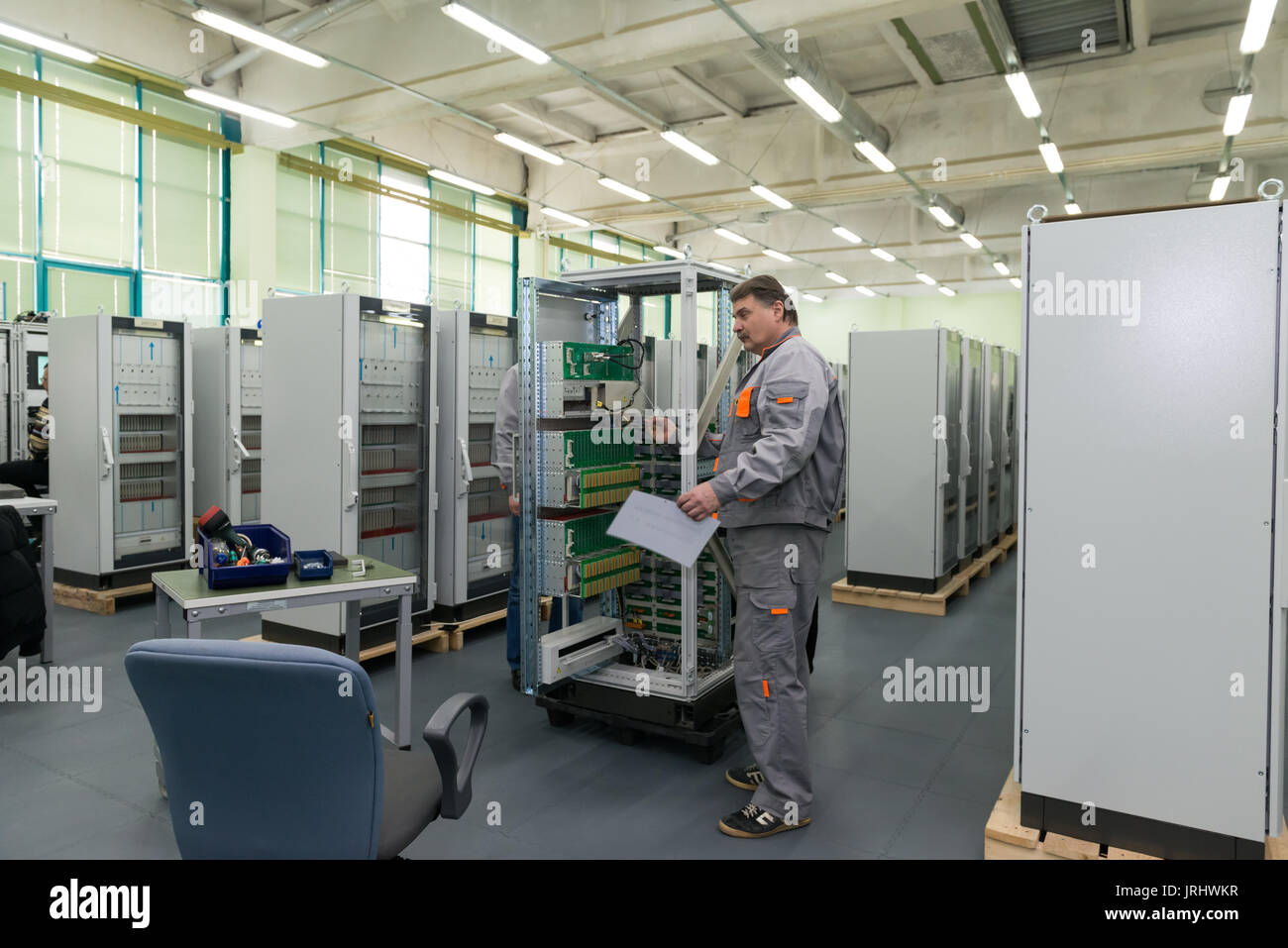 Production of electronic components at high-tech factory Stock Photo ...