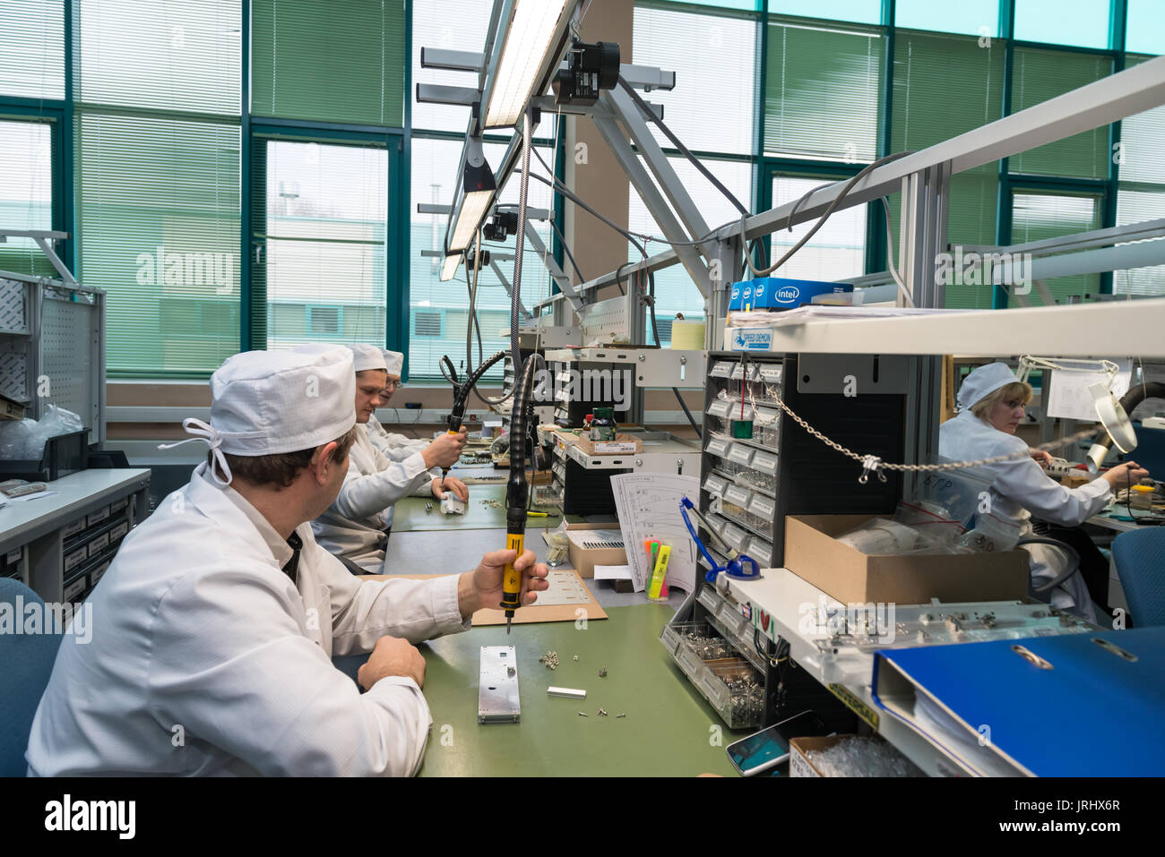 Production of electronic components at high-tech factory Stock Photo ...