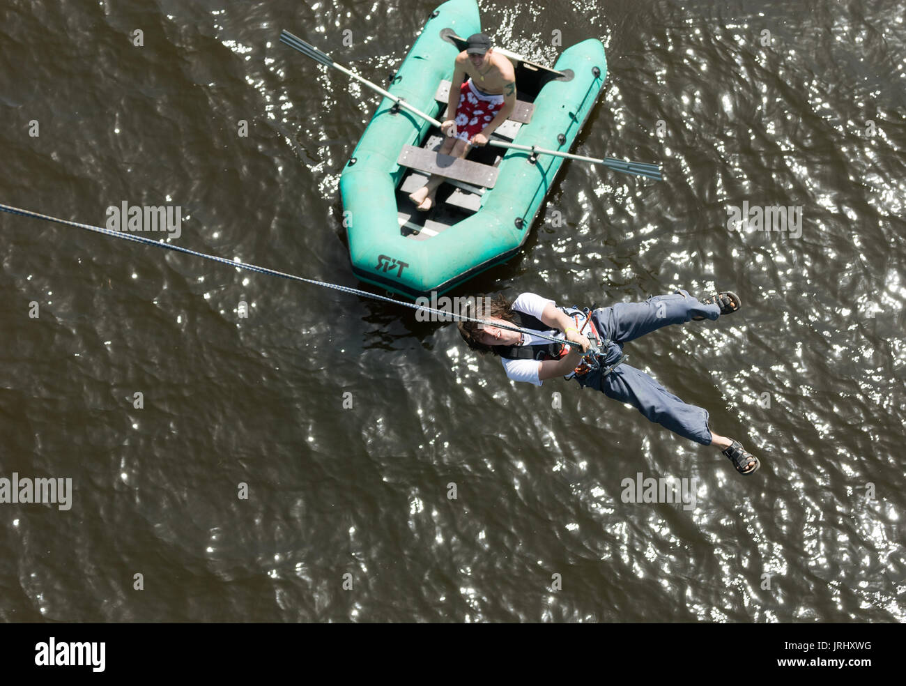 Extreme ropejumping scene Stock Photo - Alamy