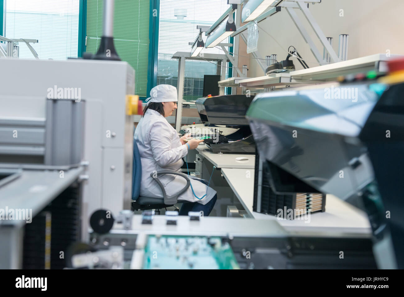 Production of electronic components at high-tech factory Stock Photo ...
