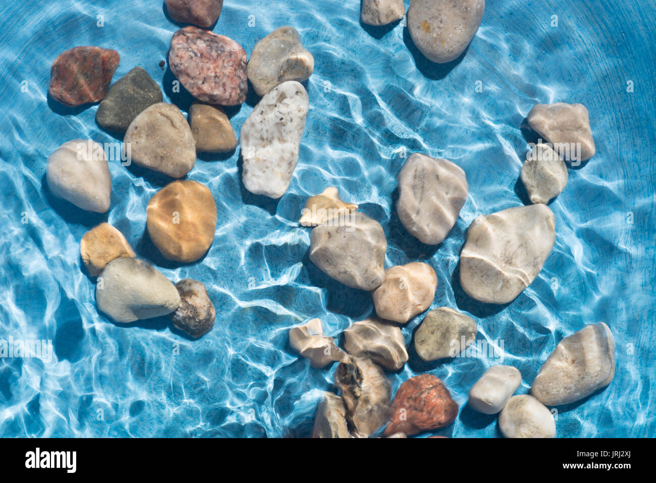 Smooth pebble stones in water hi-res stock photography and images - Alamy